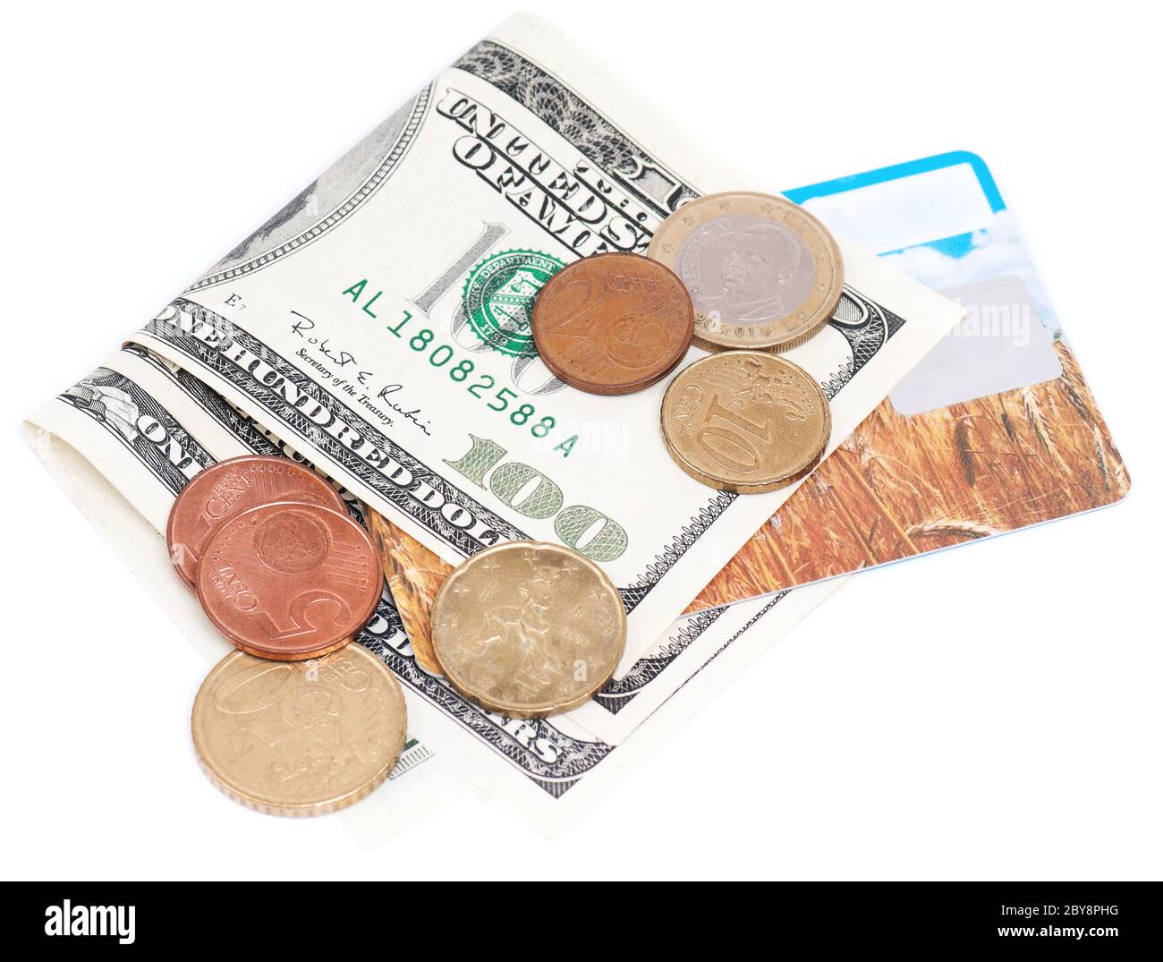 Coins over bills Stock Photo - Alamy