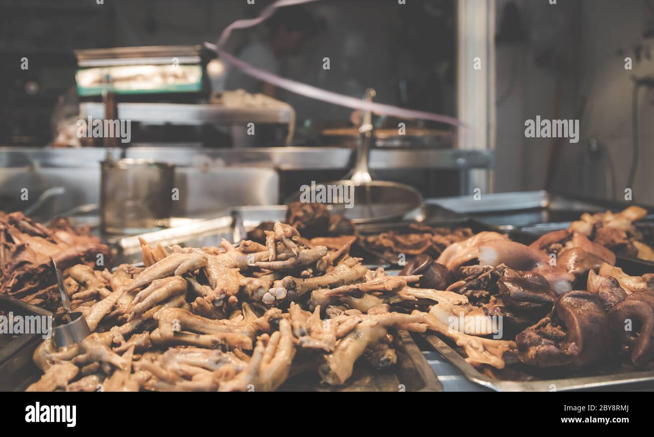 Chicken pieces including feet for sale on the chinese market in the ...