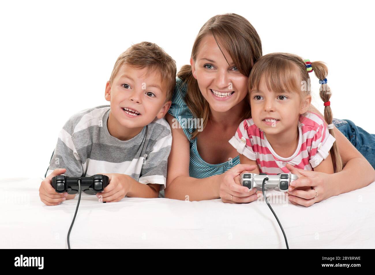 Happy family playing a video game Stock Photo - Alamy