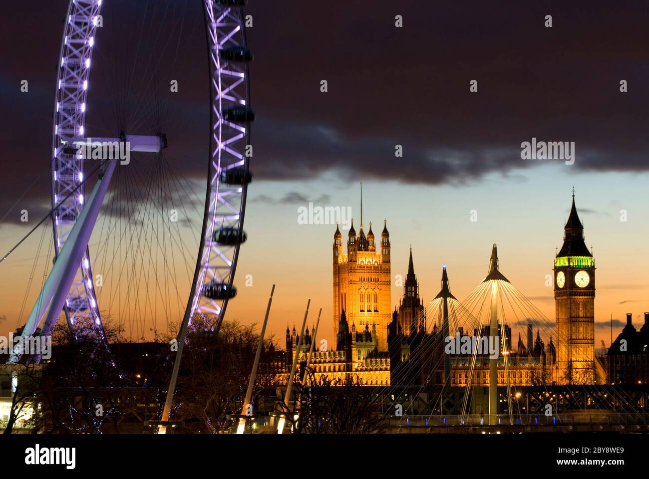 Houses of Parliament and The London Eye at sunset, London, England, UK ...