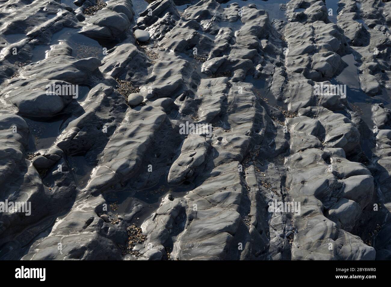 Rockpools on a beach hi-res stock photography and images - Alamy
