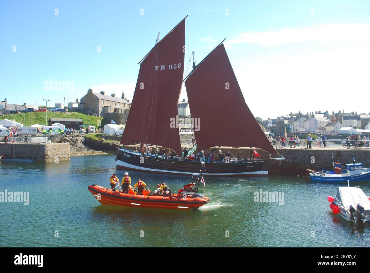 Portsoy Harbour in Aberdeenshire, Scotland, UK, busy with vessels for ...