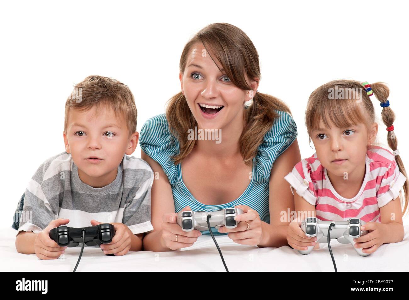 Happy family playing a video game Stock Photo - Alamy