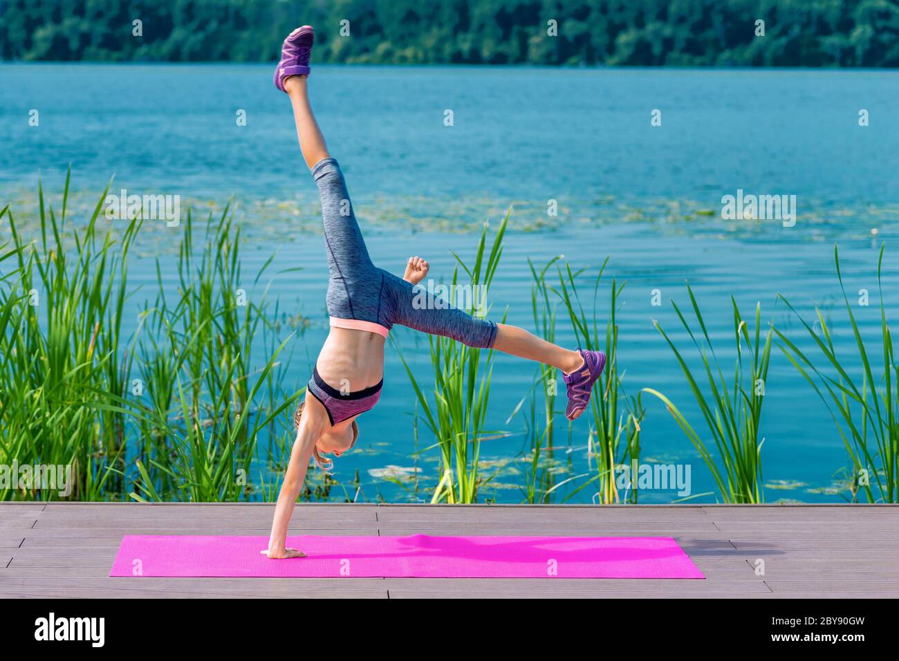 Girl Cartwheel Handstand High Resolution Stock Photography and Images ...