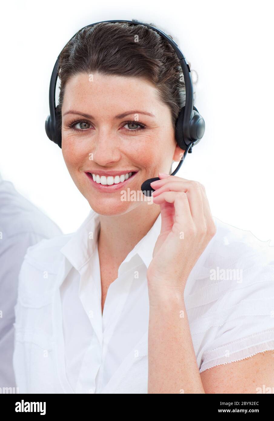 Portrait of a charming customer service agent against a white ...