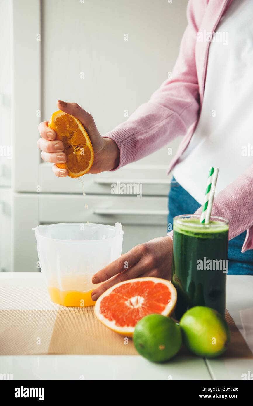 Hand Squeezing Orange Juice High Resolution Stock Photography and ...