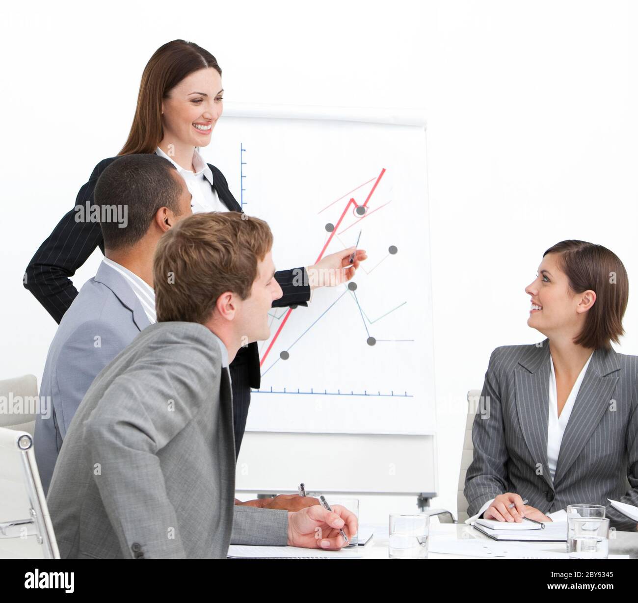Diverse man doing presentation to hi-res stock photography and images ...