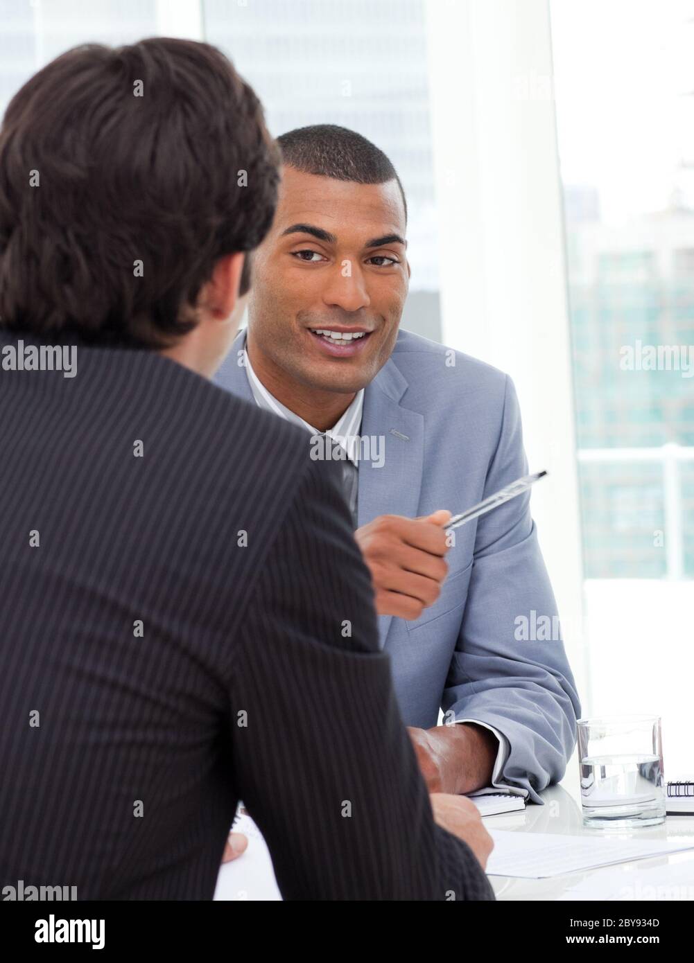 Two businessmen having presentation hi-res stock photography and images ...