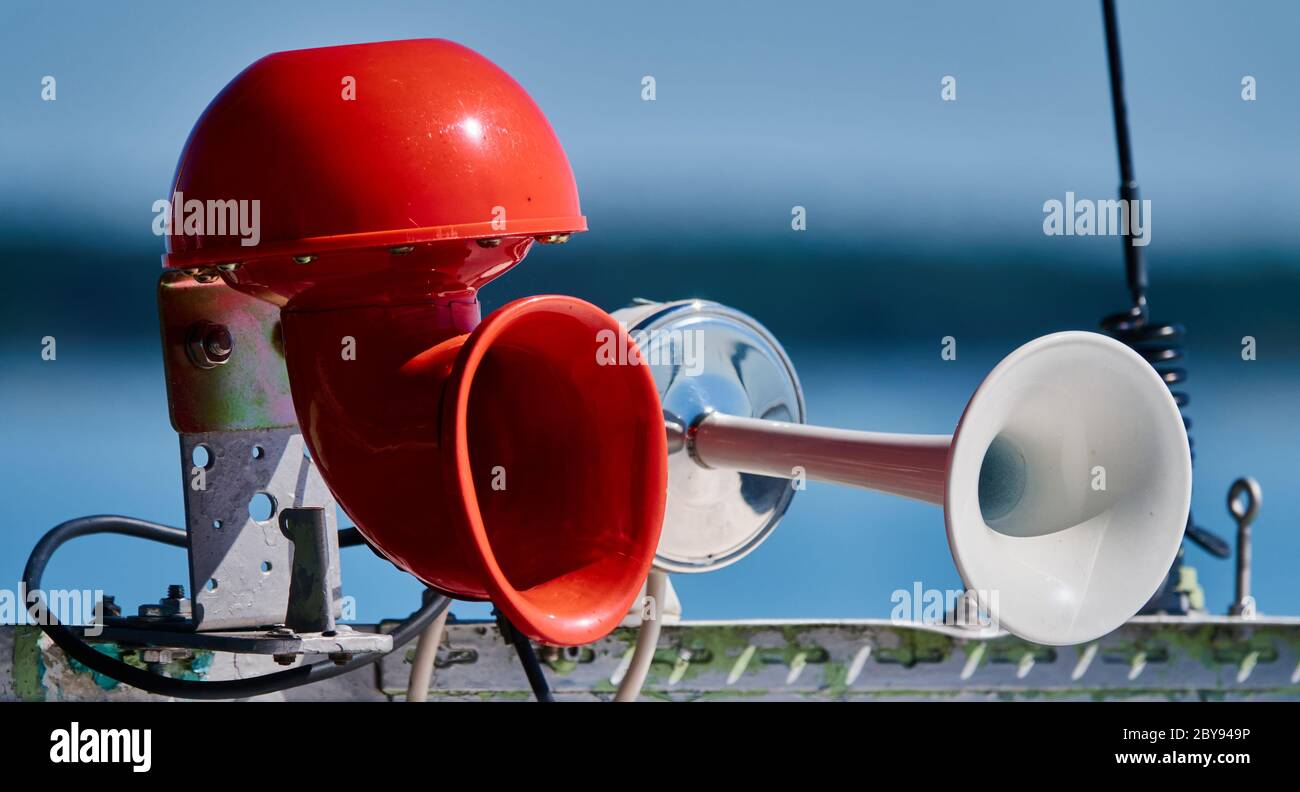 Close-up of the red and white signal horns on the deck of an excursion ...