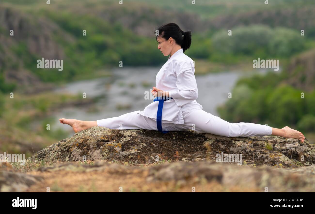 Woman doing karate kick hi-res stock photography and images - Alamy