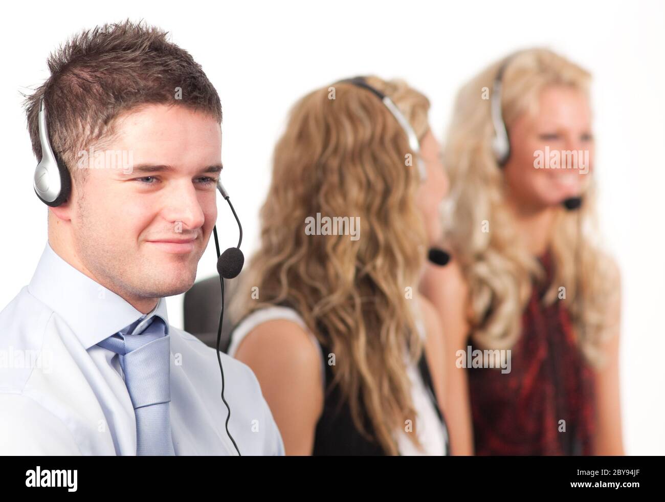 Three people in a call centre Stock Photo - Alamy