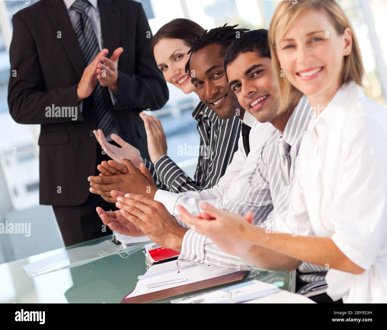 Portrait african businessman clapping in hi-res stock photography and ...