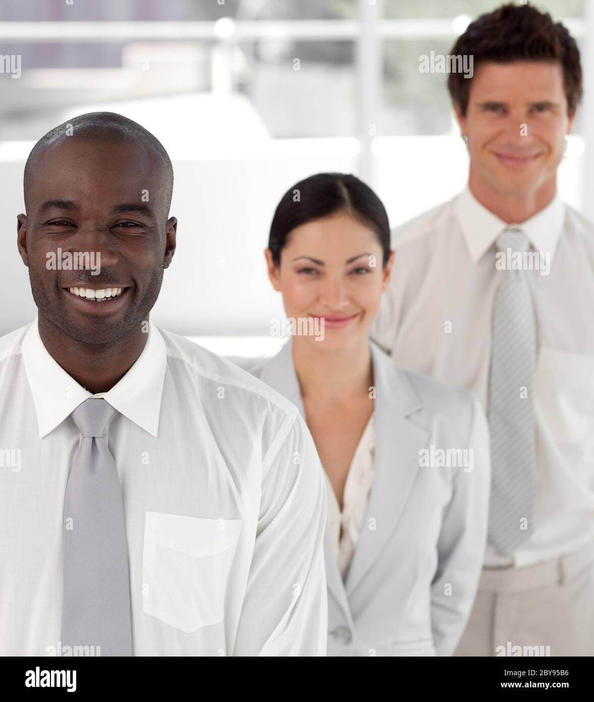 Charming people talking together at work Stock Photo - Alamy