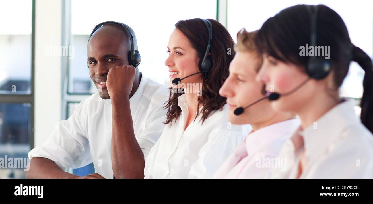 Portrait of a professional multi-ethnic sale representative team at ...