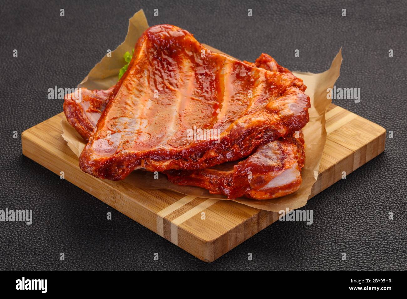 Raw marinated pork ribs ready for cooking Stock Photo - Alamy