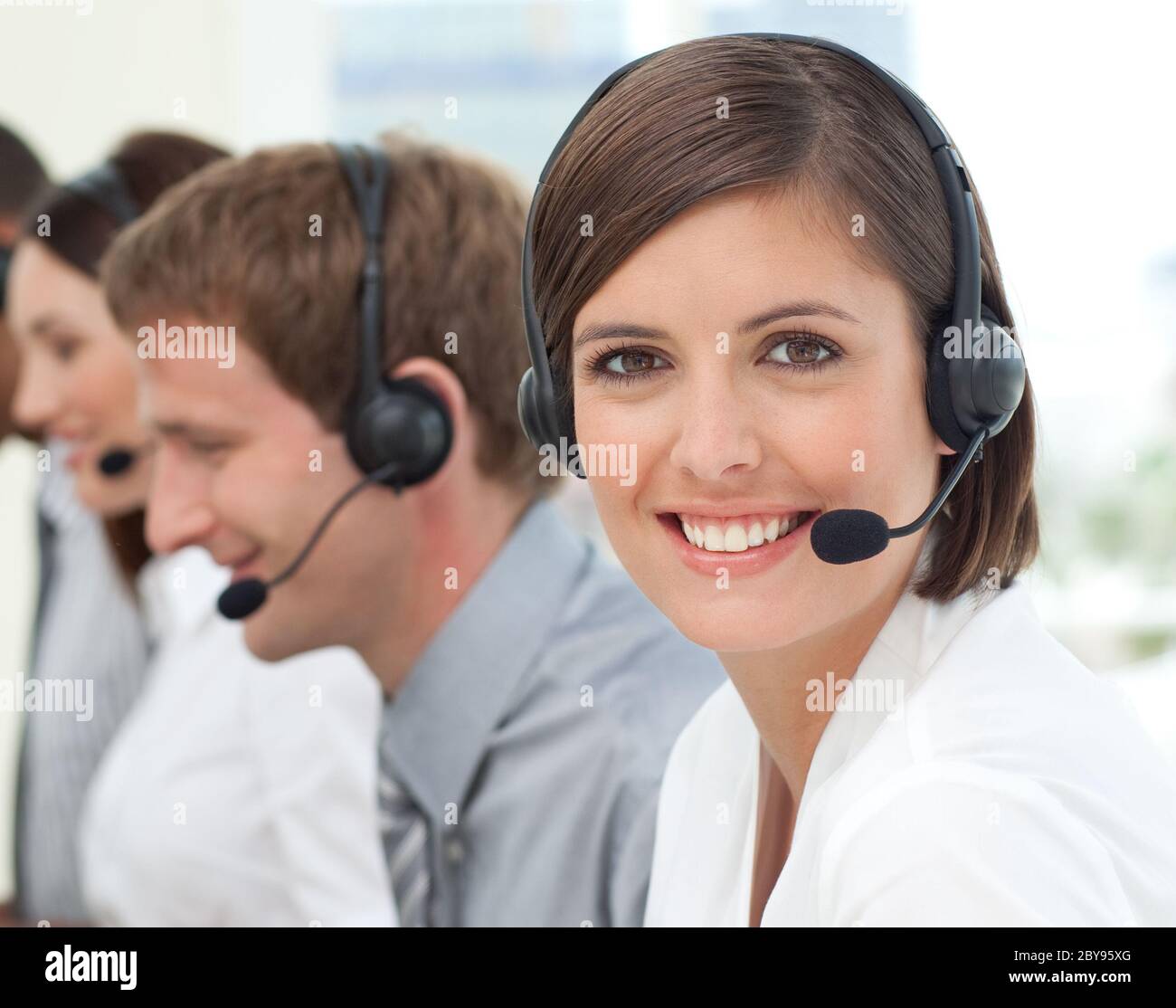 Female customer service agent in a call center Stock Photo - Alamy