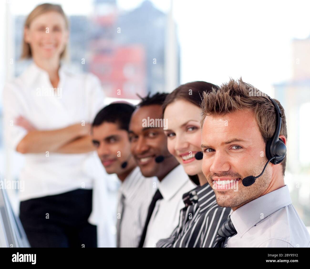 Caucasian manager leading her representative team Stock Photo - Alamy
