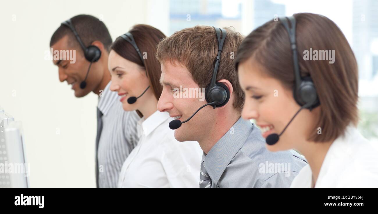 Happy call center workers hi-res stock photography and images - Alamy