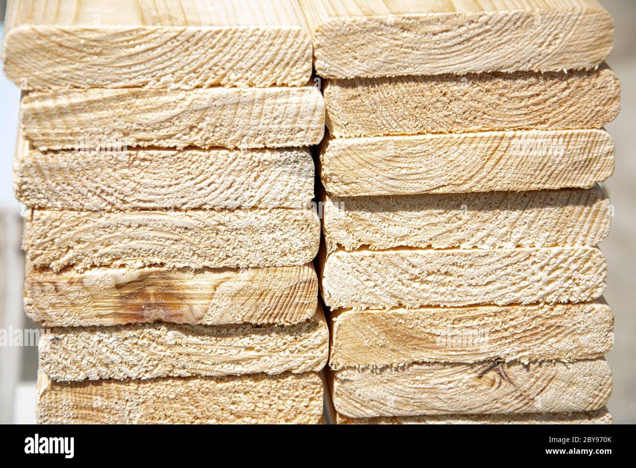 Wood timber stack of pine board. Piles of wooden boards in the sawmill ...