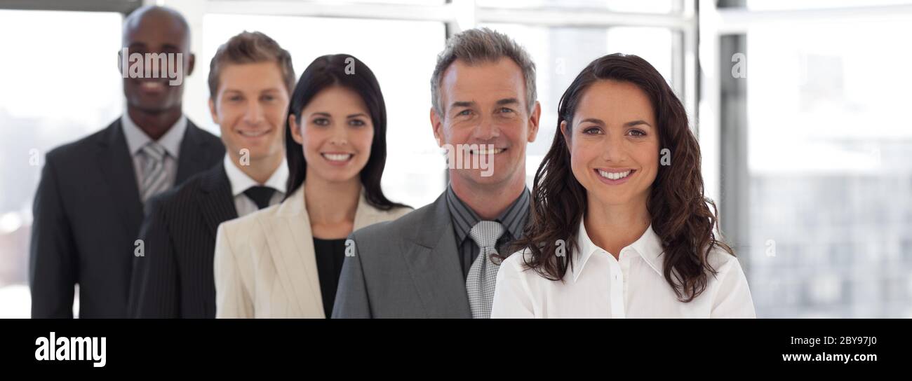 Business woman leading a business team Stock Photo - Alamy