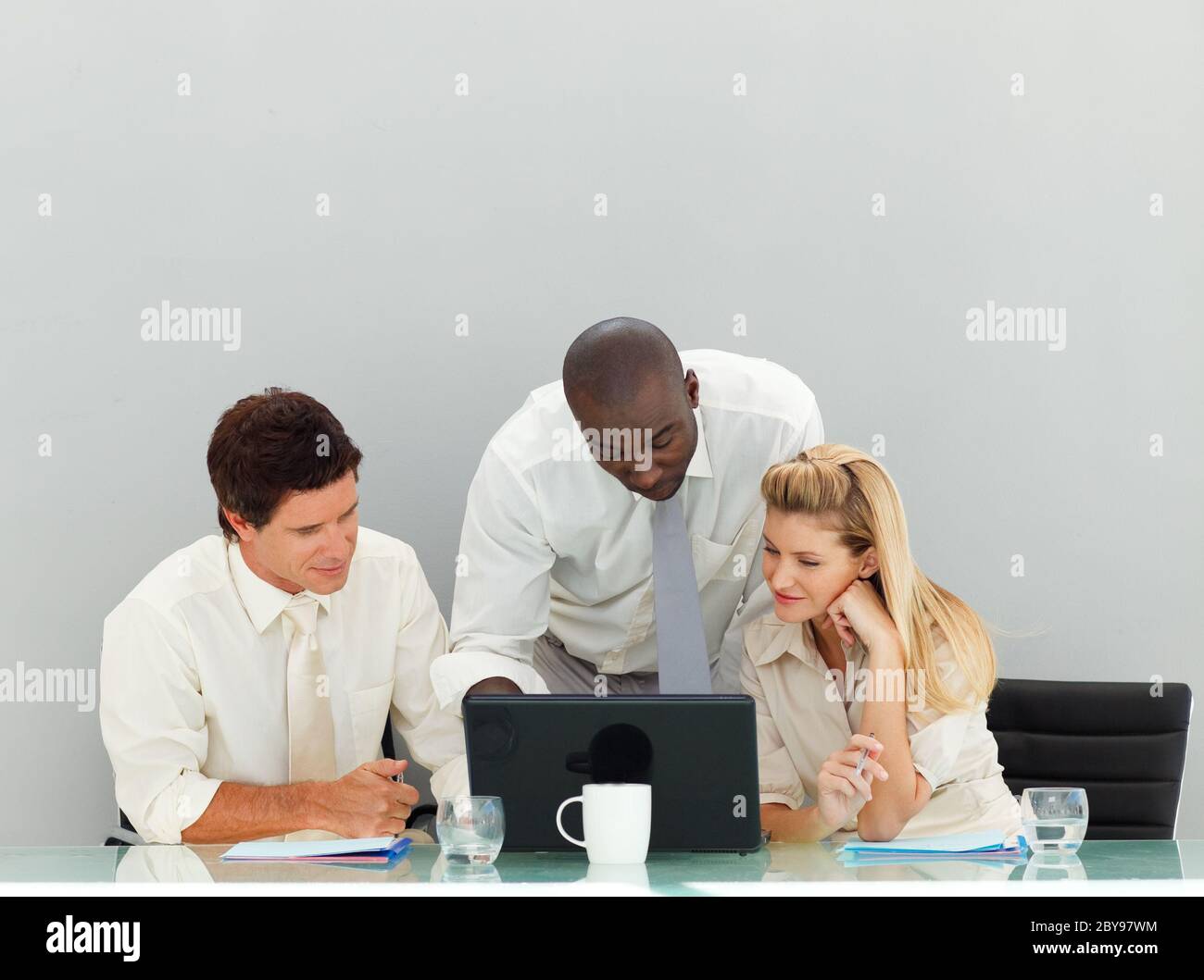 International business people working in an office Stock Photo - Alamy