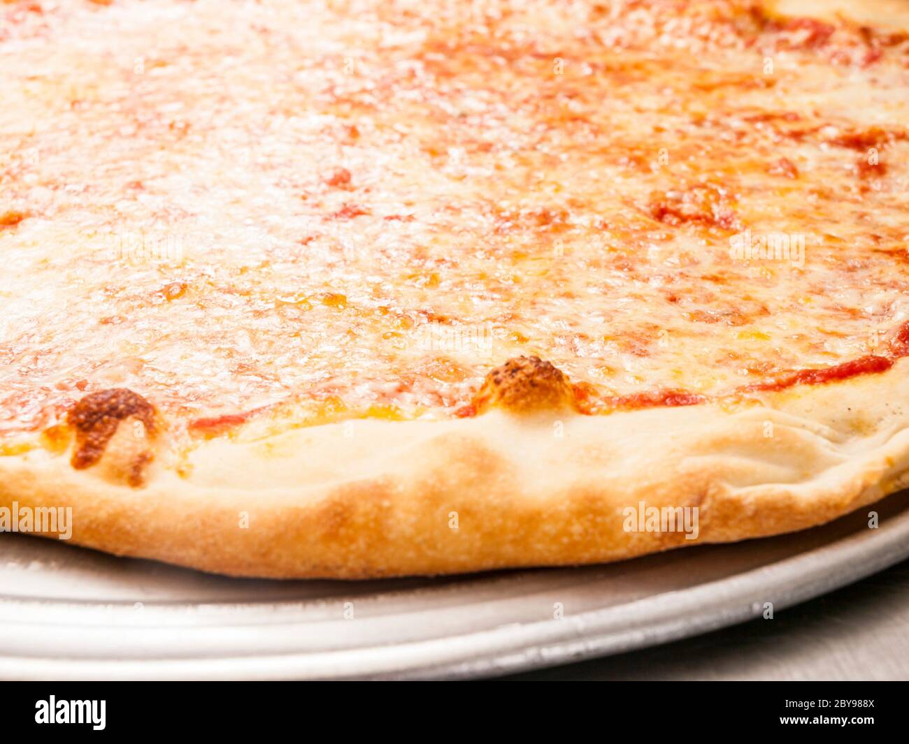 Pizza and pizza making Pizza on display at counter Stock Photo - Alamy