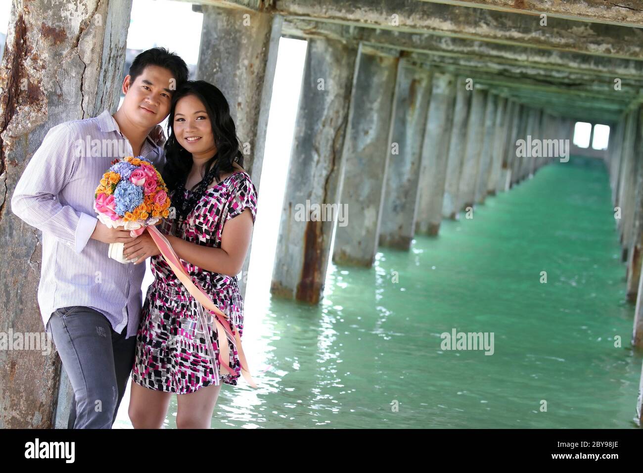 sweet couples dating at beach Stock Photo - Alamy