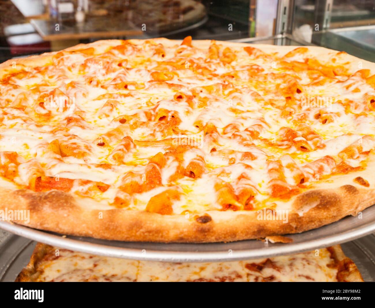 Pizza and pizza making Pizza on display at counter Stock Photo - Alamy