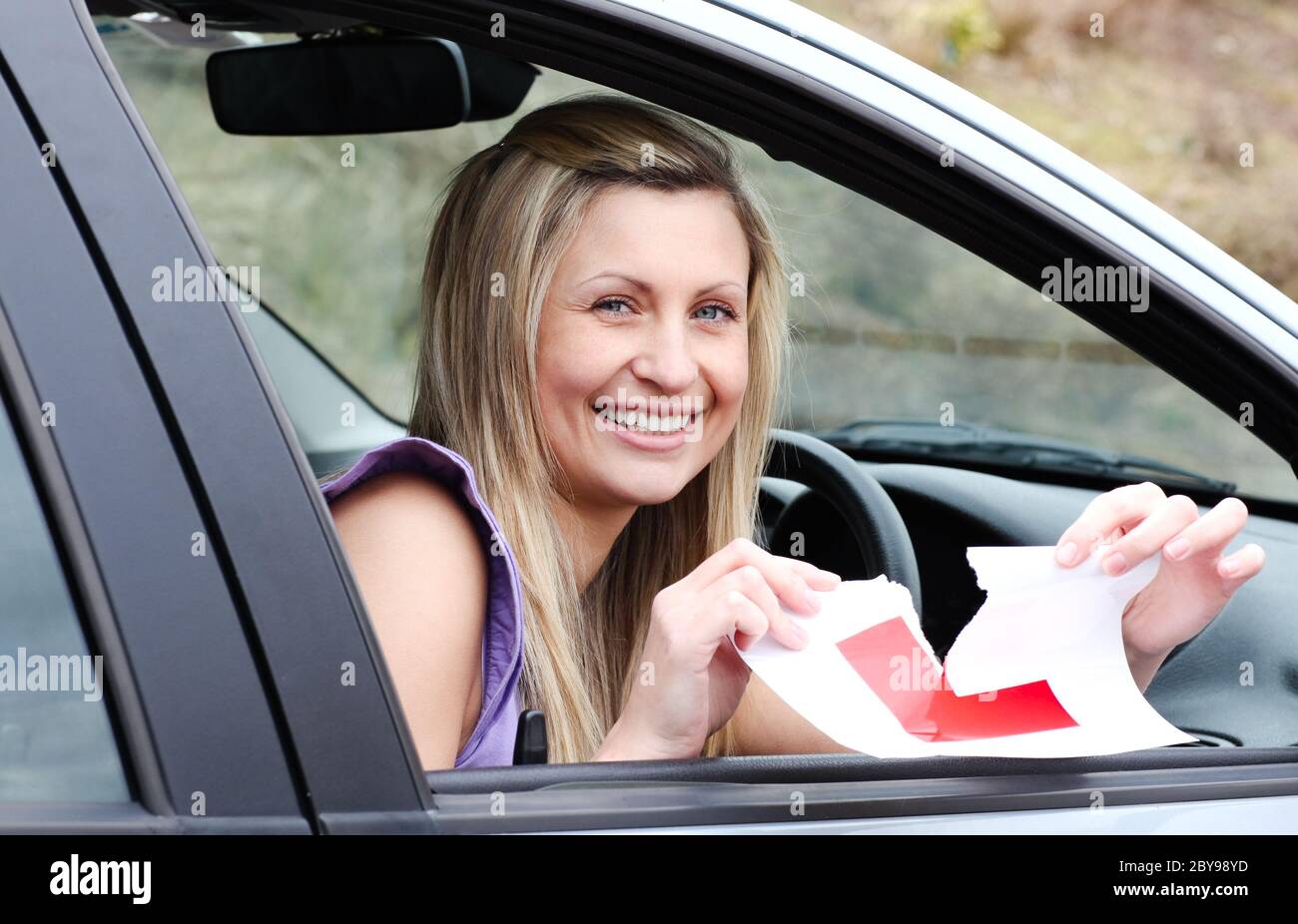 Person tearing up hi-res stock photography and images - Alamy