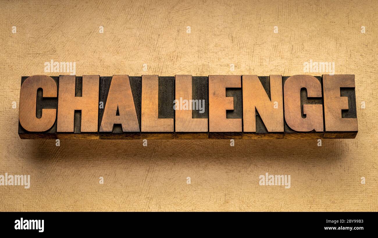 challenge word abstract in vintage letterpress wood type against ...