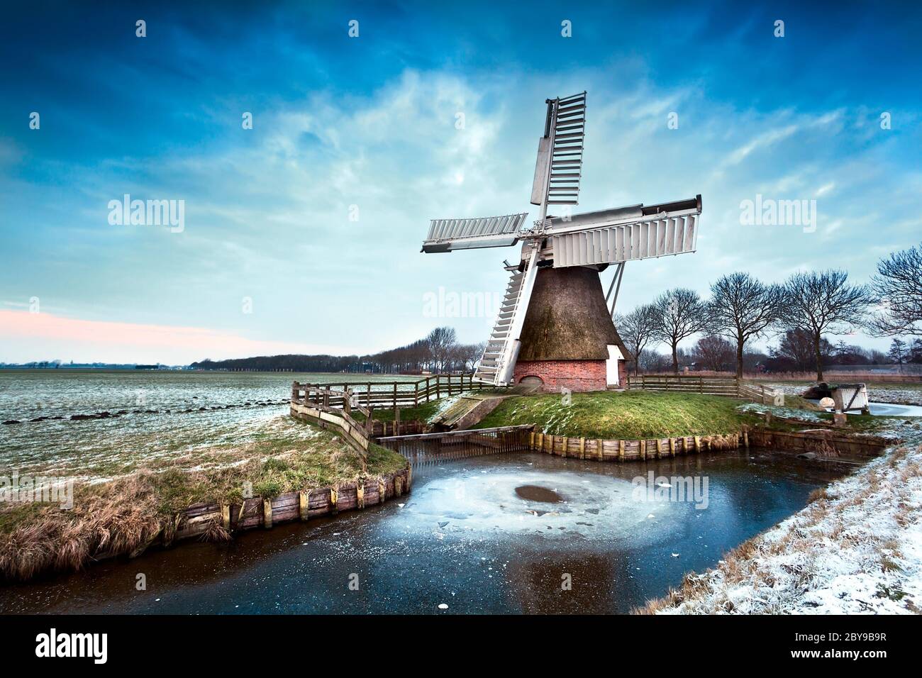Dutch windmill in winter Stock Photo - Alamy