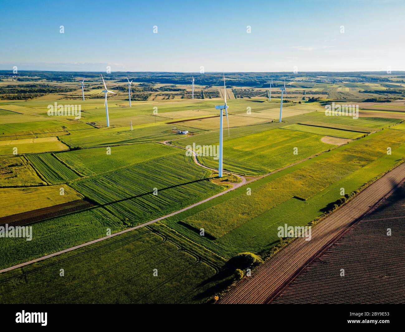 Aerial view of a wind farm on the field Stock Photo - Alamy
