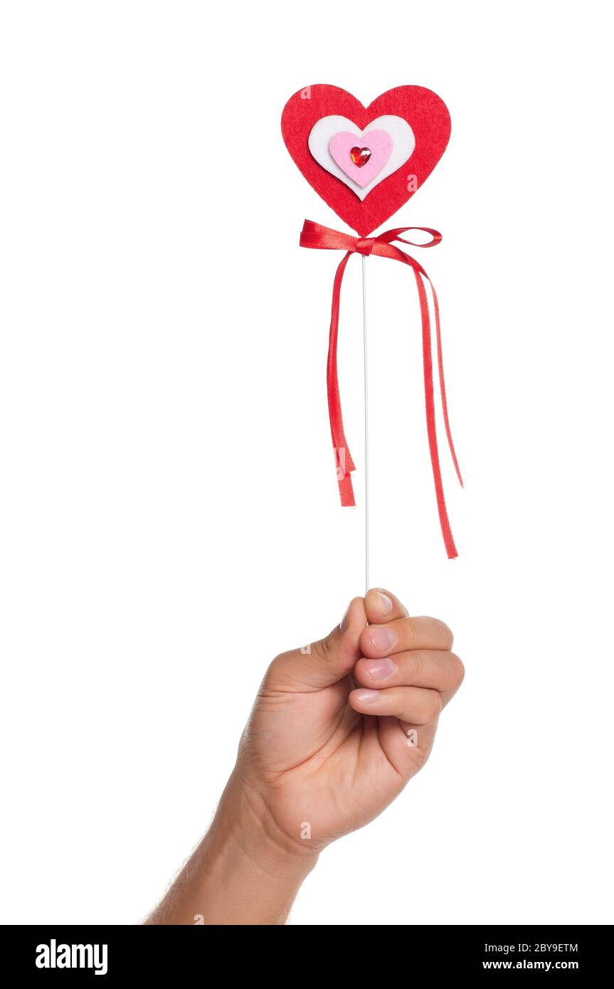 Hand heart ribbon Cut Out Stock Images & Pictures - Alamy