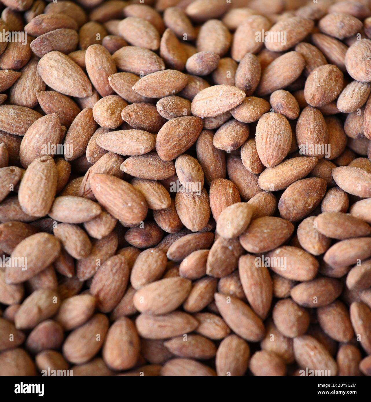 Nuts texture background Stock Photo - Alamy