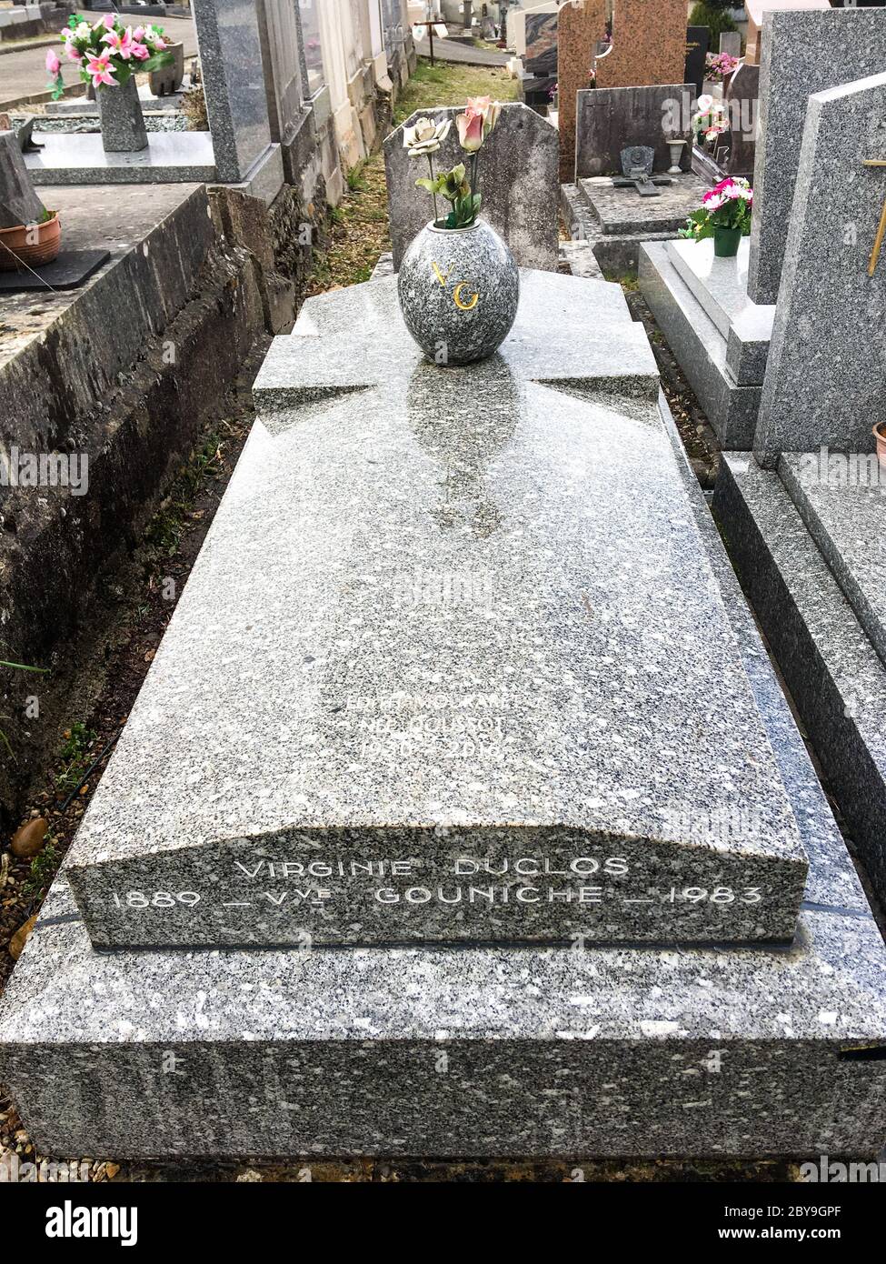 Tombstone in an old provincial cemetery, Fontaine-sur-Saône, Rhône ...