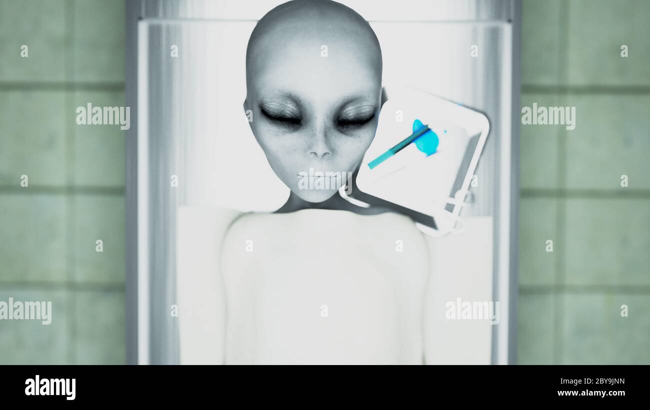 The dead alien in the morgue on the table. Futuristic autopsy concept ...
