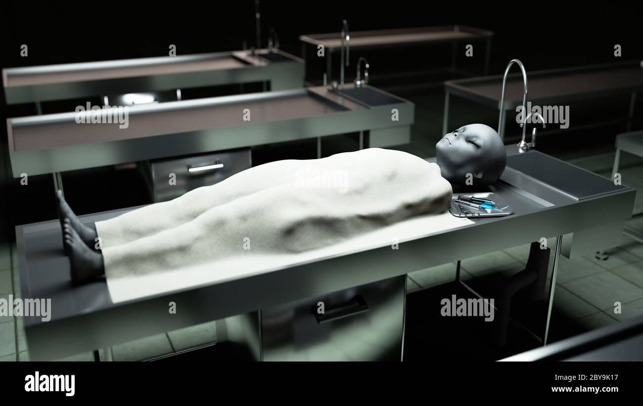 The dead alien in the morgue on the table. Futuristic autopsy concept ...