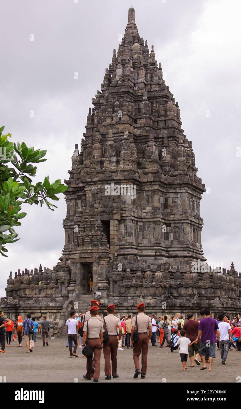 Tourists at famous Prambanan hindu temple tower, Yogyakarta, Java, Indonesia. Candi Prambanan ...