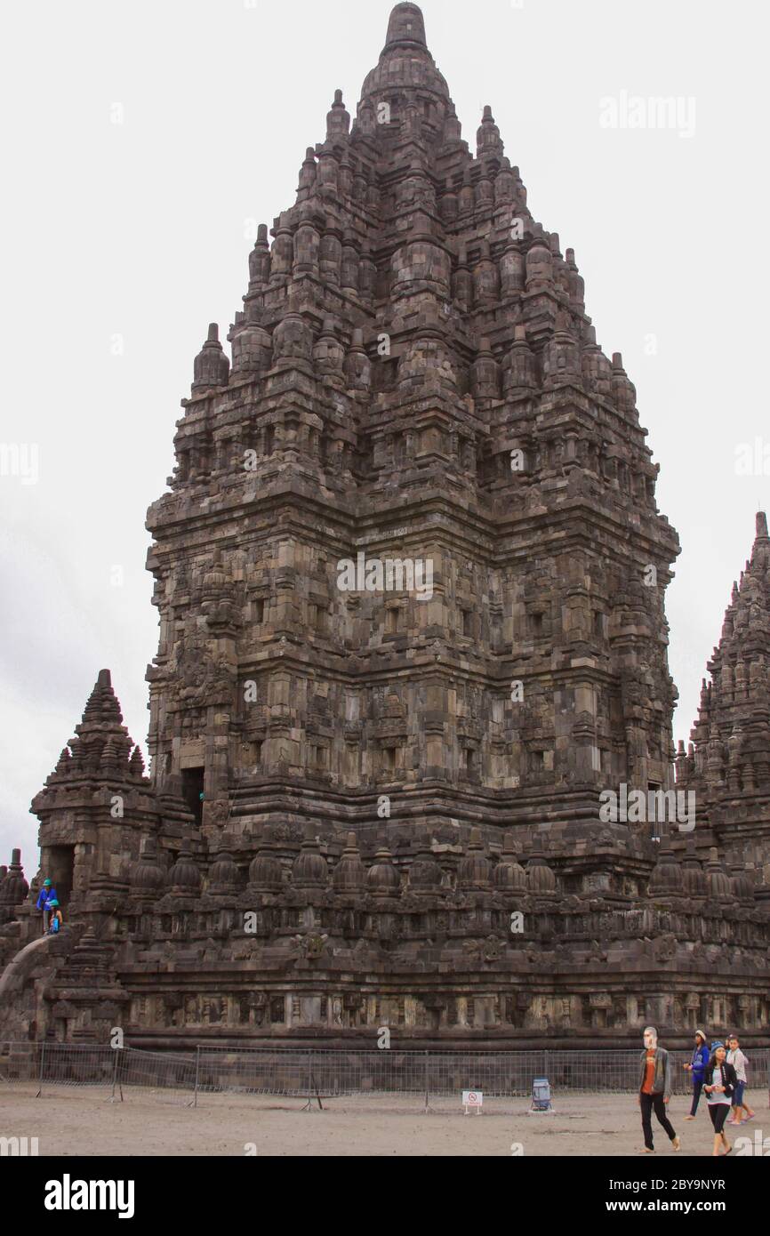 Tourists at famous Prambanan hindu temple tower, Yogyakarta, Java, Indonesia. Candi Prambanan ...
