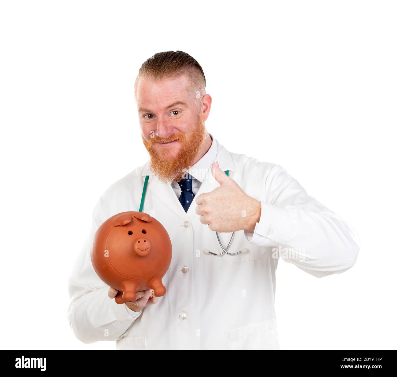 Redhead doctor with a medical gown isolated on a white background Stock ...