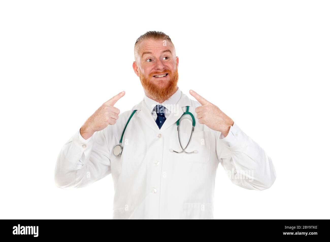 Redhead doctor with a medical gown isolated on a white background Stock ...