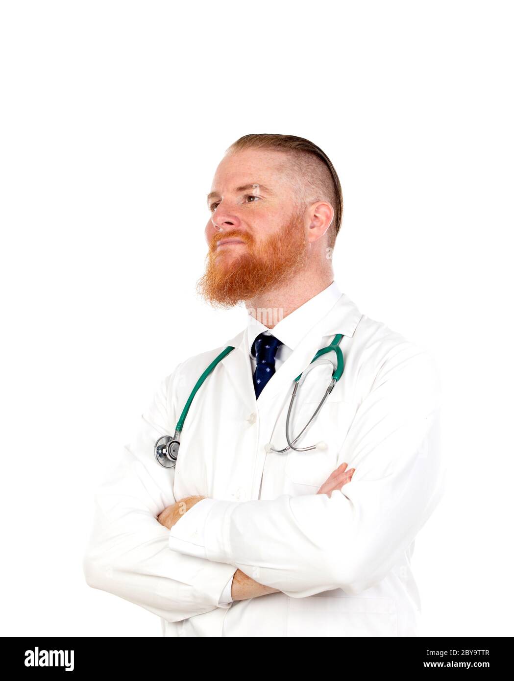 Redhead doctor with a medical gown isolated on a white background Stock ...