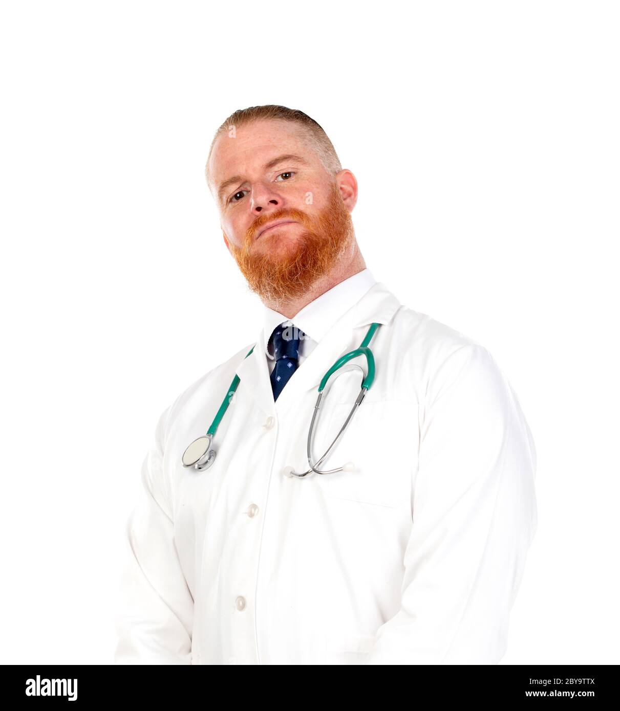 Redhead doctor with a medical gown isolated on a white background Stock ...
