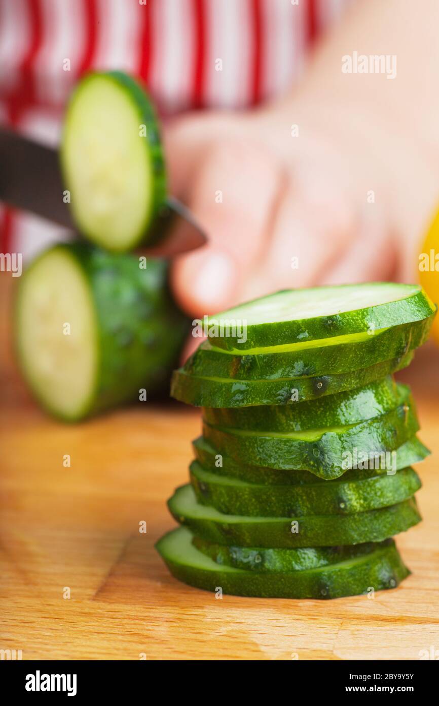 Cutting cucumber hi-res stock photography and images - Alamy