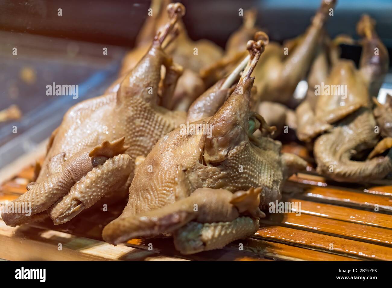 Whole cooked chickens for sale on the chinese market in the Muslim ...