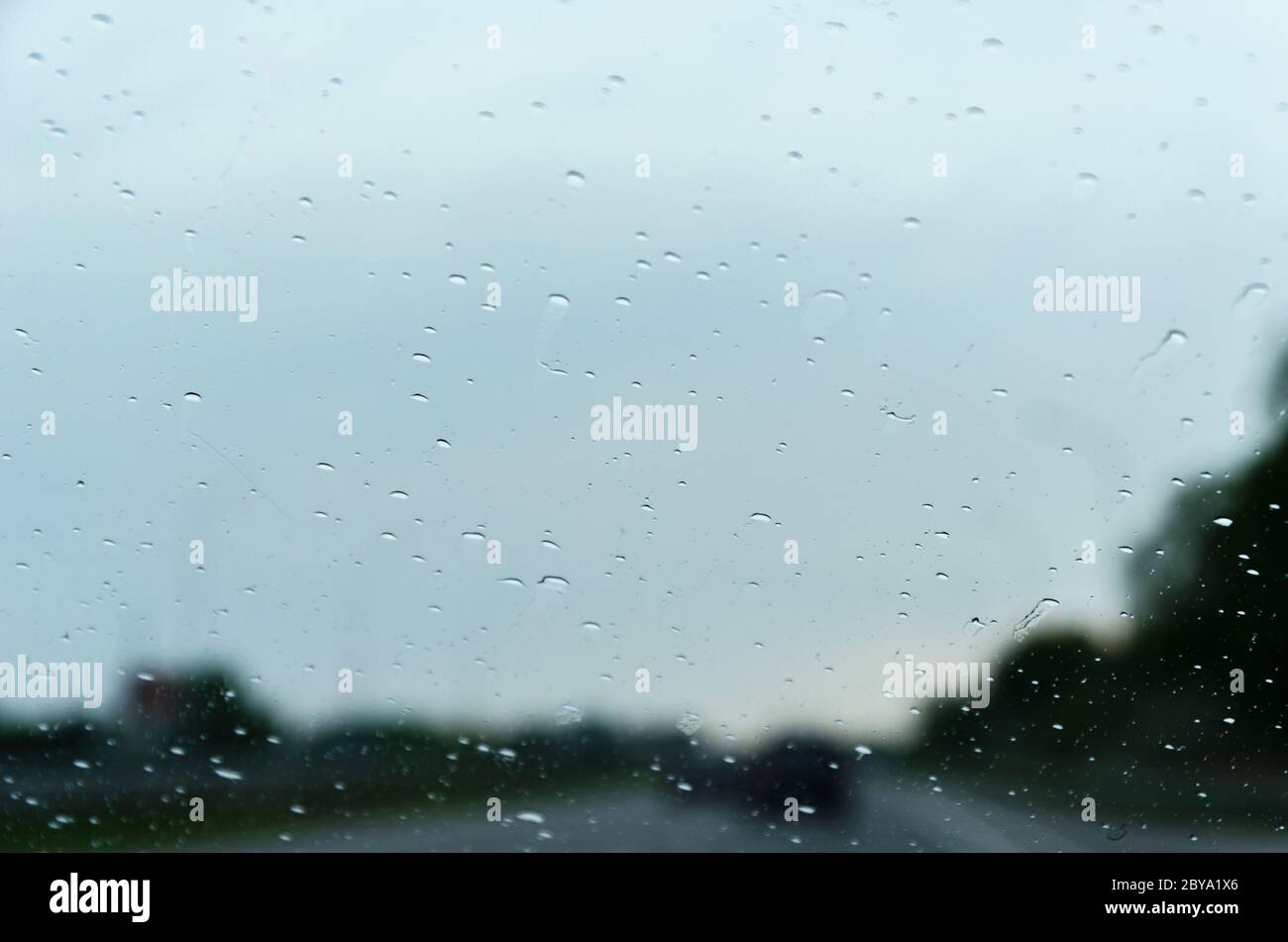 Car windshield raindrops on blurred hi-res stock photography and images ...