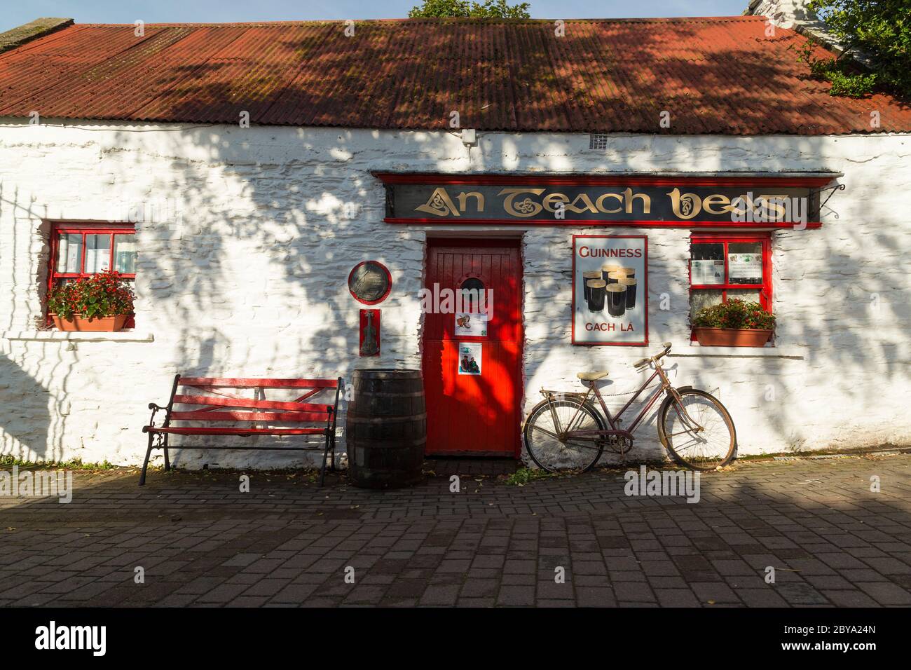 Whitewashed, small Irish pub exterior Stock Photo - Alamy