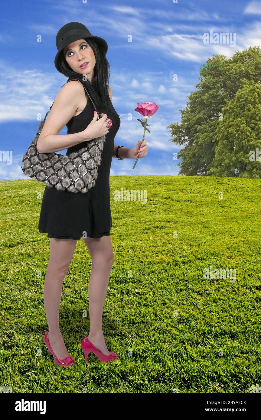 Woman Holding Rose Stock Photo - Alamy