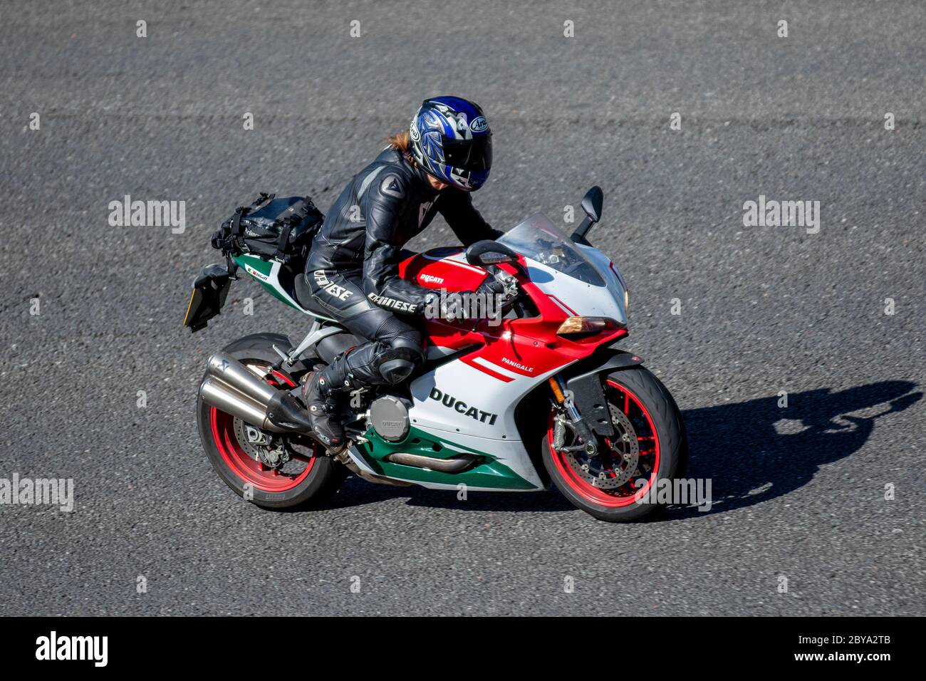 Ducati Panigale; Motorbike rider; two wheeled transport, motorcycles ...