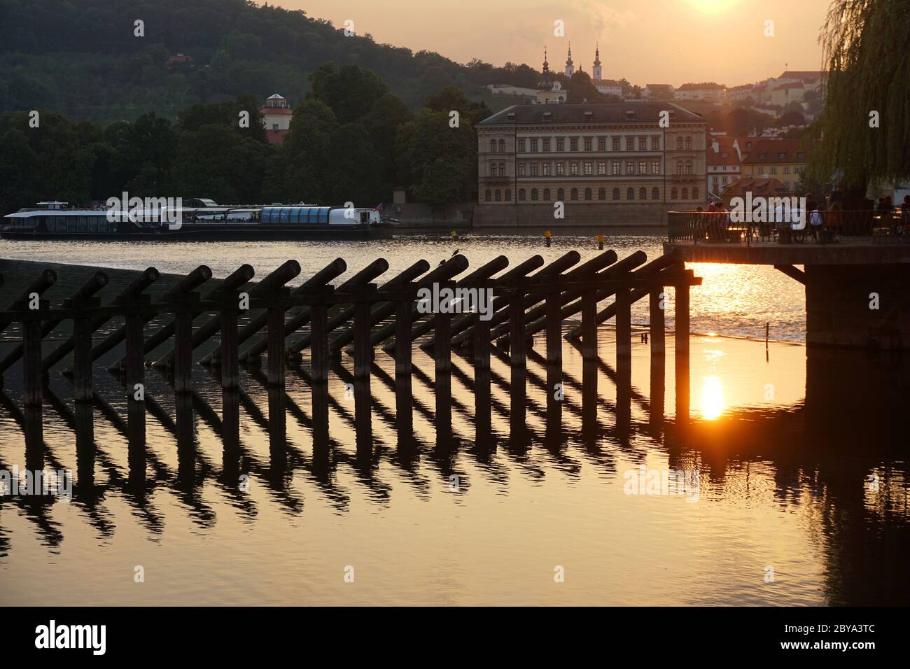 Sunset over Moldava the river of Praga Stock Photo - Alamy